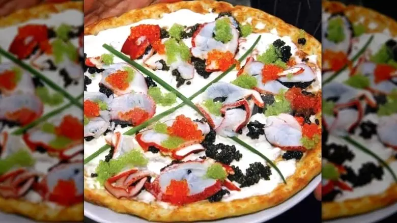 $ 10,000 Pizza evela Renato Viola