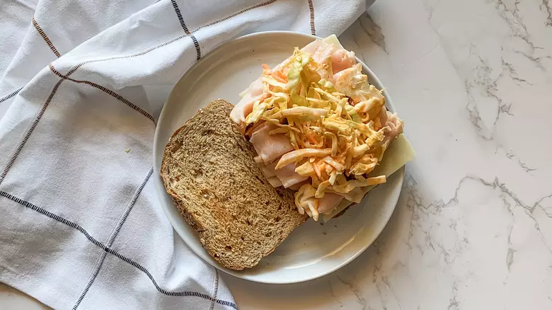 assembling Reuben sandwich