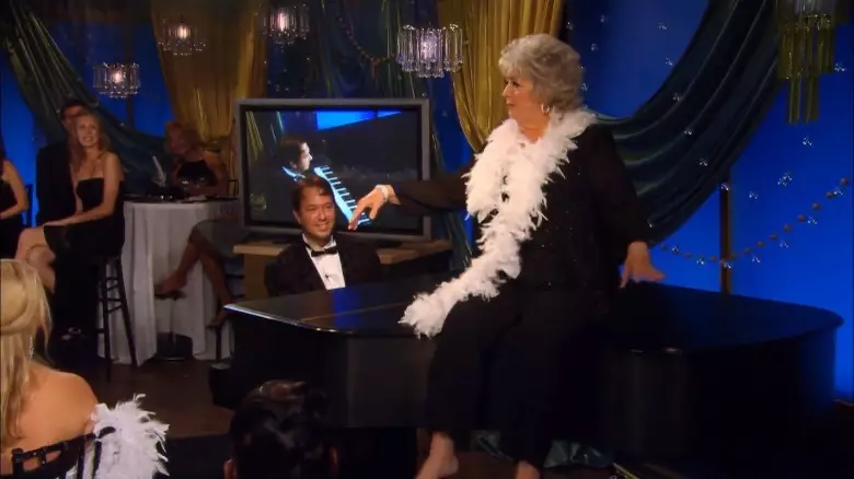 Paula Deen in feather boa