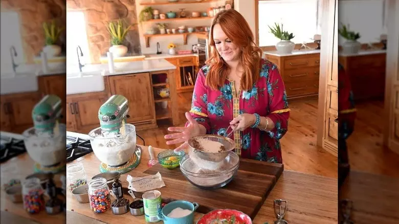 Ree Drummond cooking by har Oklahoma lodge