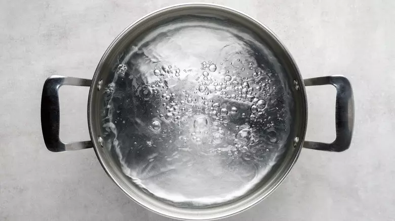 Stainless steel pot ilma jagħli