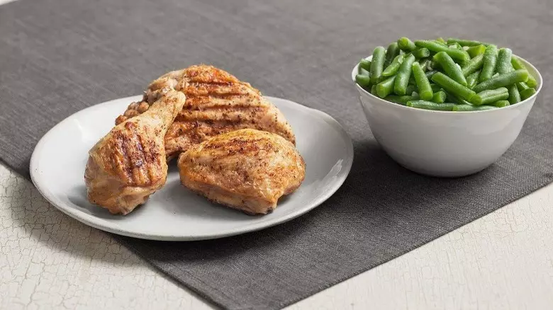 KFC Kentucky Grilled Chicken on white plate with green beans
