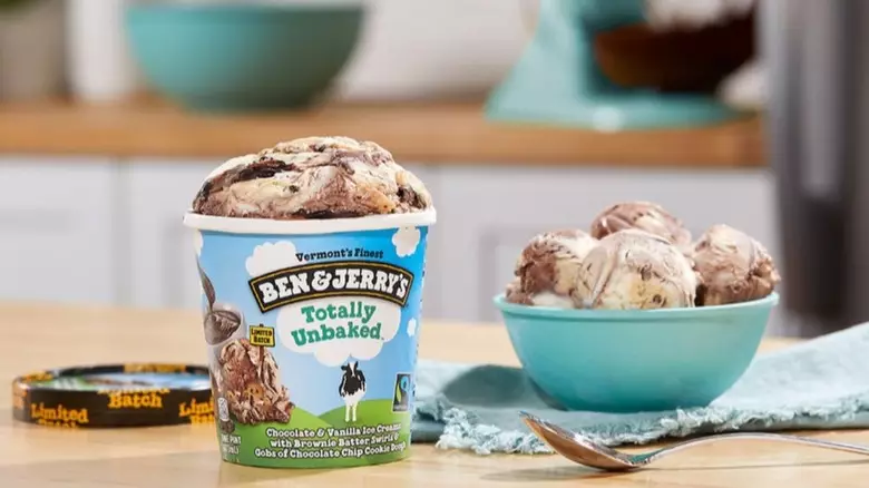 Pint of Ben & Jerry's Totally Unbaked on counter with spon