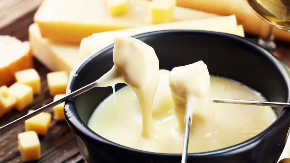 Foto fan in fondue pot