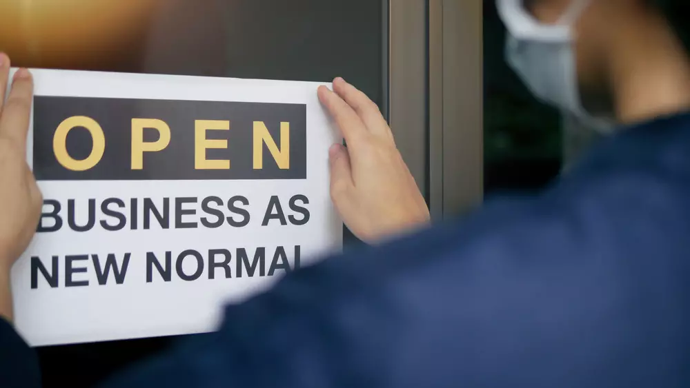 otwarty dla biznesu jako nowy normalny znak